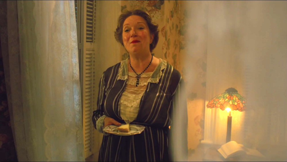 Mom also seems to be wearing an awful lot of makeup for the era, given ...
